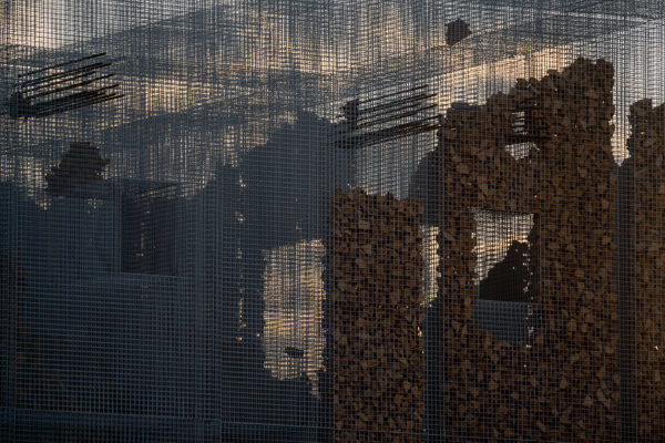 A ruin-inspired pavilion made of wire mesh and cork - MaterialDistrict