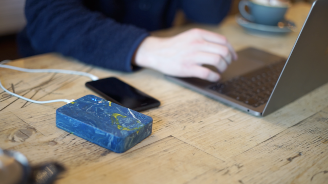 A portable charger made from plastic waste and repurposed batteries ...