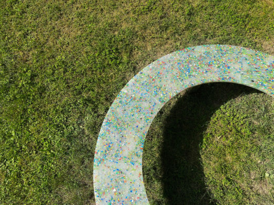 A circular bench made of recycled plastic - MaterialDistrict