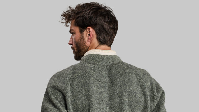 A sweater made from recycled bullet proof vests and firefighter suits ...