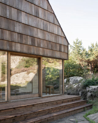 A house made of wooden off-cuts from floor production - MaterialDistrict