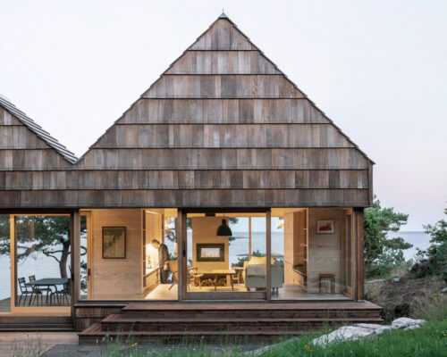 A house made of wooden off-cuts from floor production - MaterialDistrict