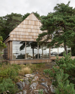 A house made of wooden off-cuts from floor production - MaterialDistrict