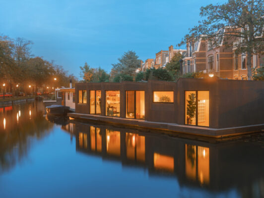 A CLT houseboat with a cork façade - MaterialDistrict