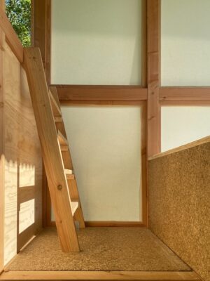 A temporary overnight location made of canvas and wood - MaterialDistrict